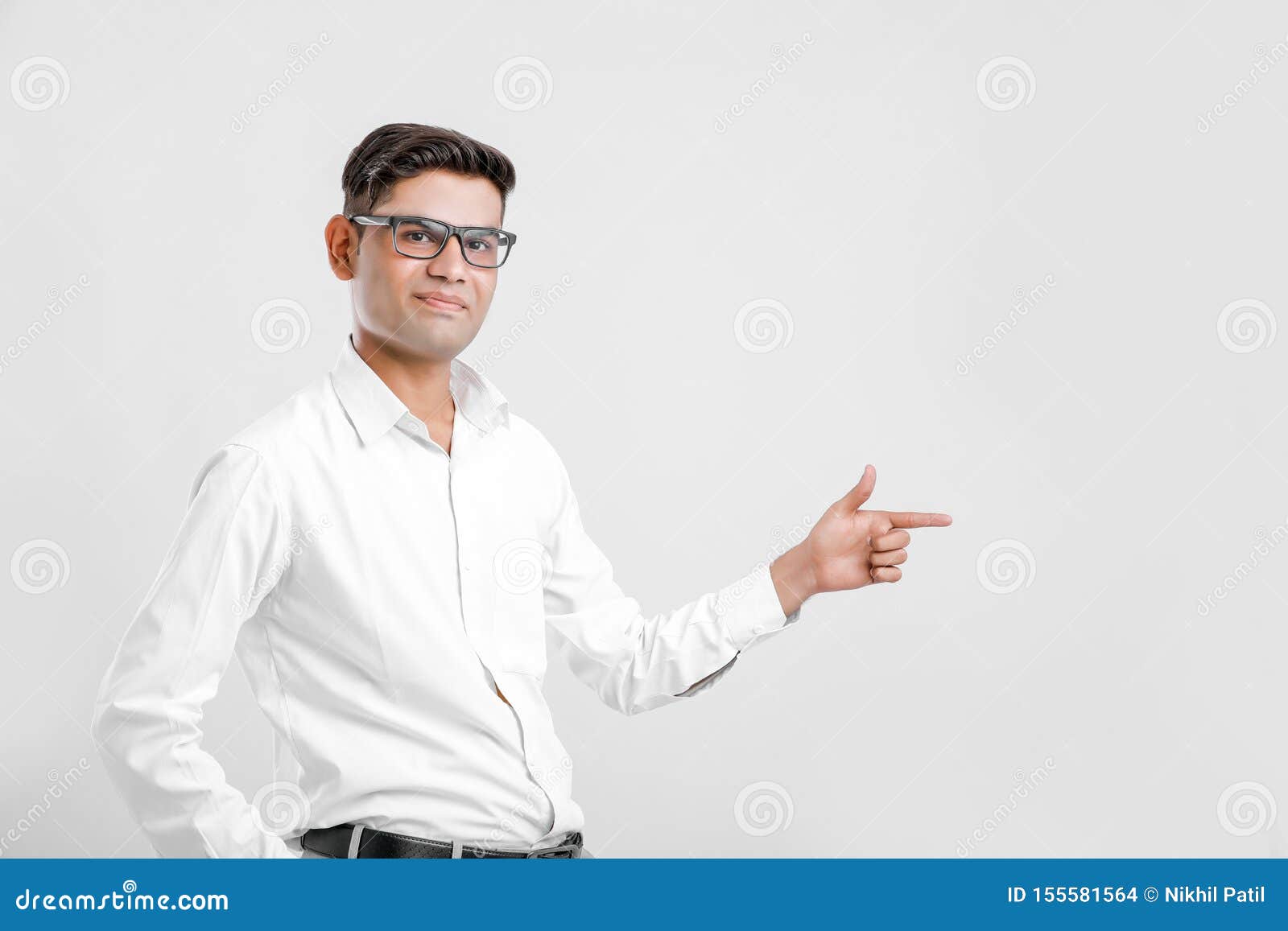 Yong Indian Man Showing Direction with Hand Stock Photo - Image of ...