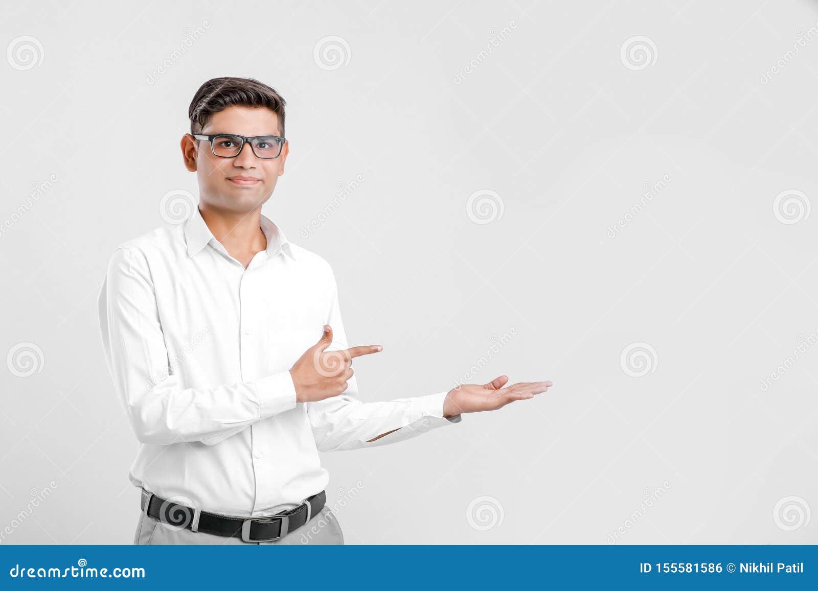 Yong Indian Man Showing Direction with Hand Stock Photo - Image of ...