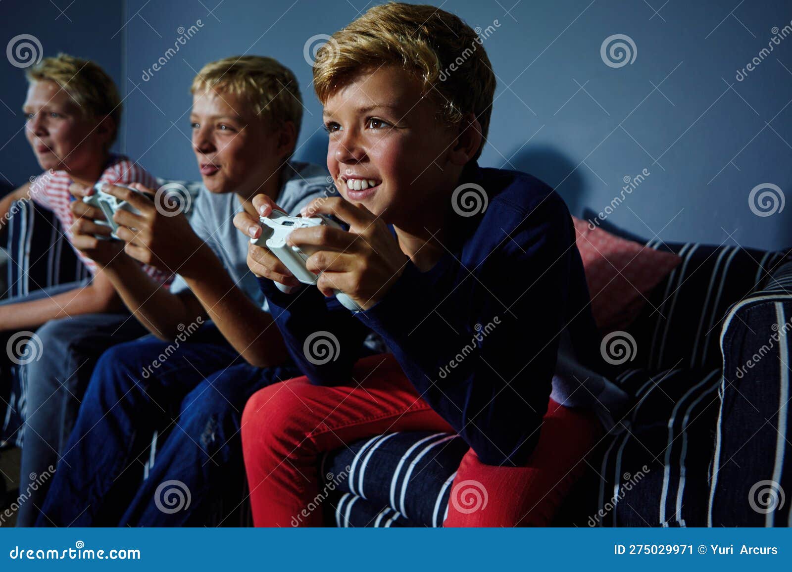 You Guys are Going Down. Young Boys Playing Video Games. Stock Image ...