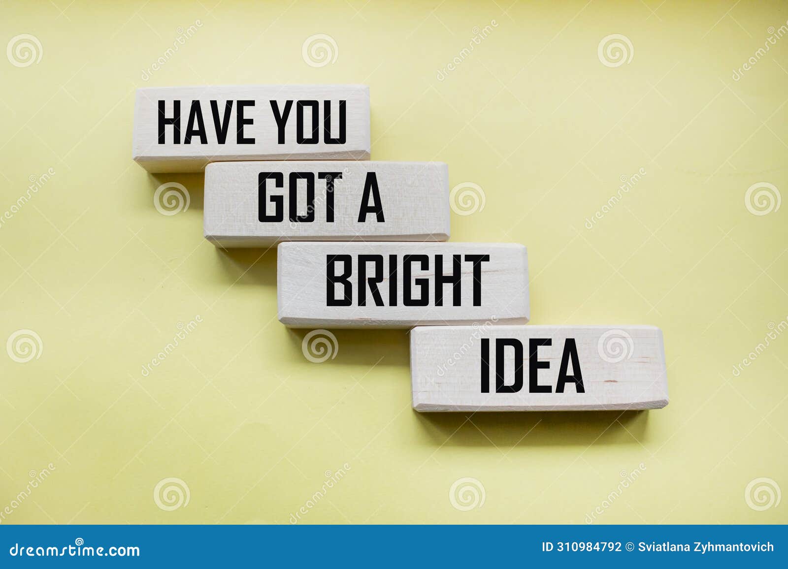 YOU HAVE a BRIGHT IDEA Word on Yellow Background on Wooden Blocks ...