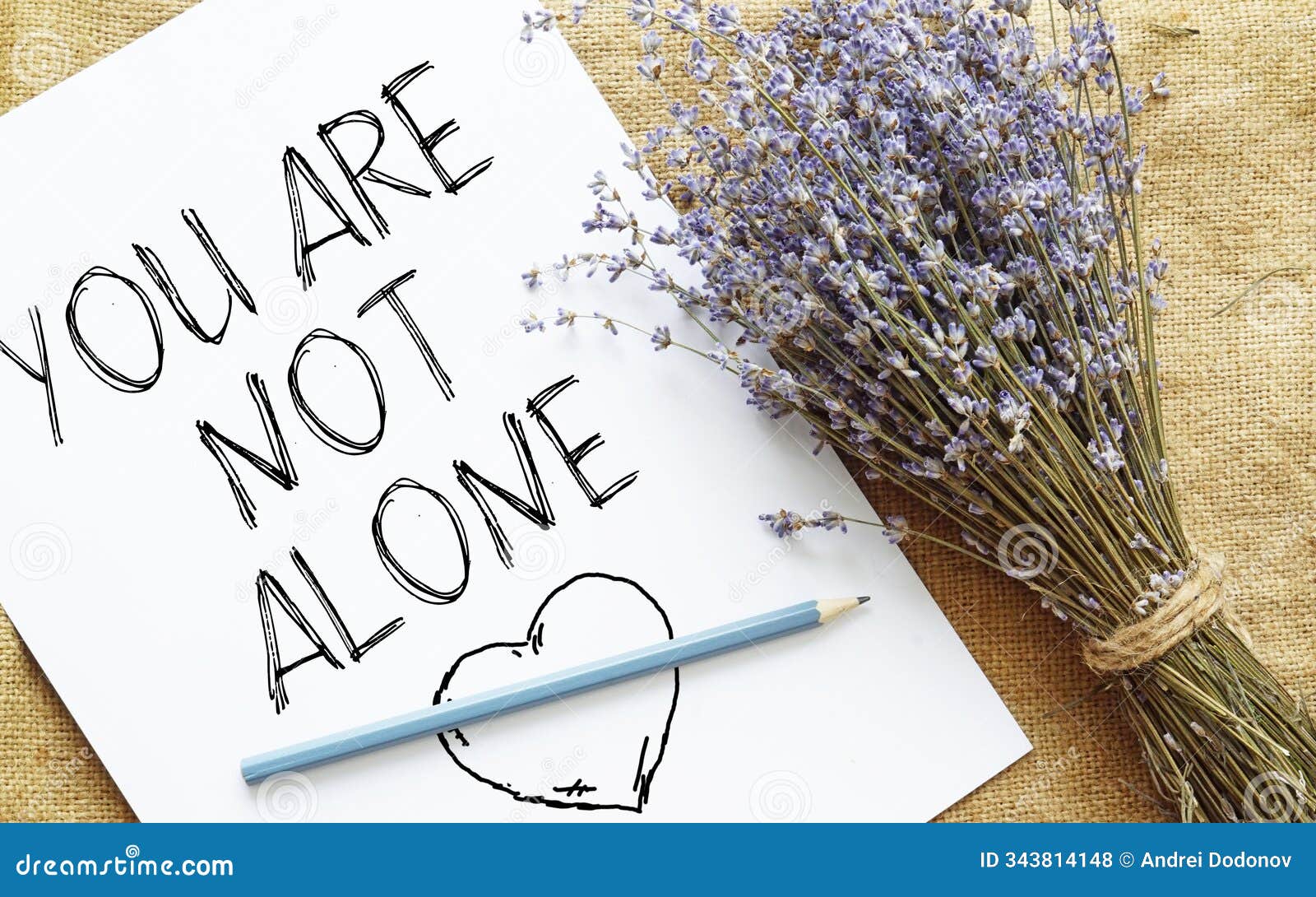 You are Not Alone is Shown Using the Text Stock Photo - Image of ...