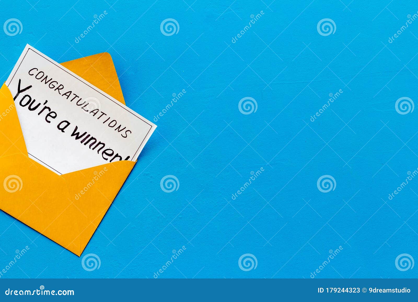 You`re a Winner. Envelope with Congratulation Card on Blue Table Top ...