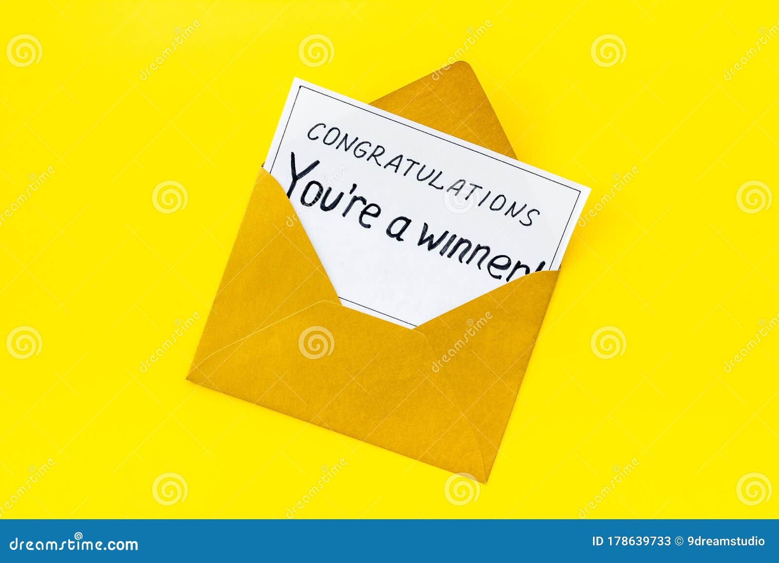 You`re a Winner. Envelope with Congratulation Card on Yellow Table Top ...