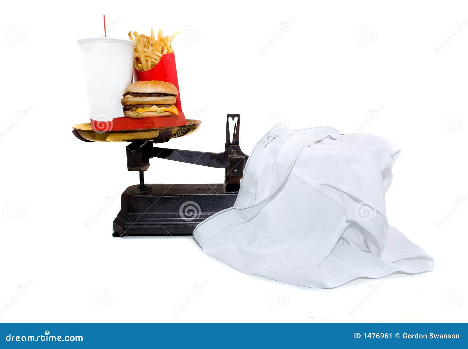 Super Sized Cheeseburger On Table Stock Photo | CartoonDealer.com #65130288