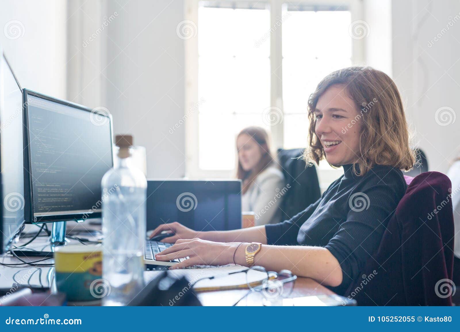 Yound Devoted Female Software Developers Team Working on Desktop ...