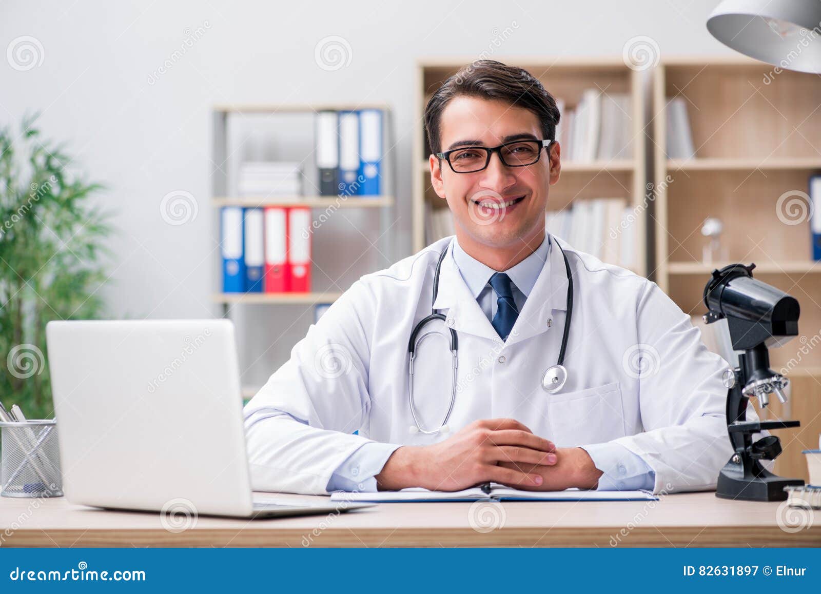 The Young Adult Doctor with Laptop Computer Stock Image - Image of exam ...