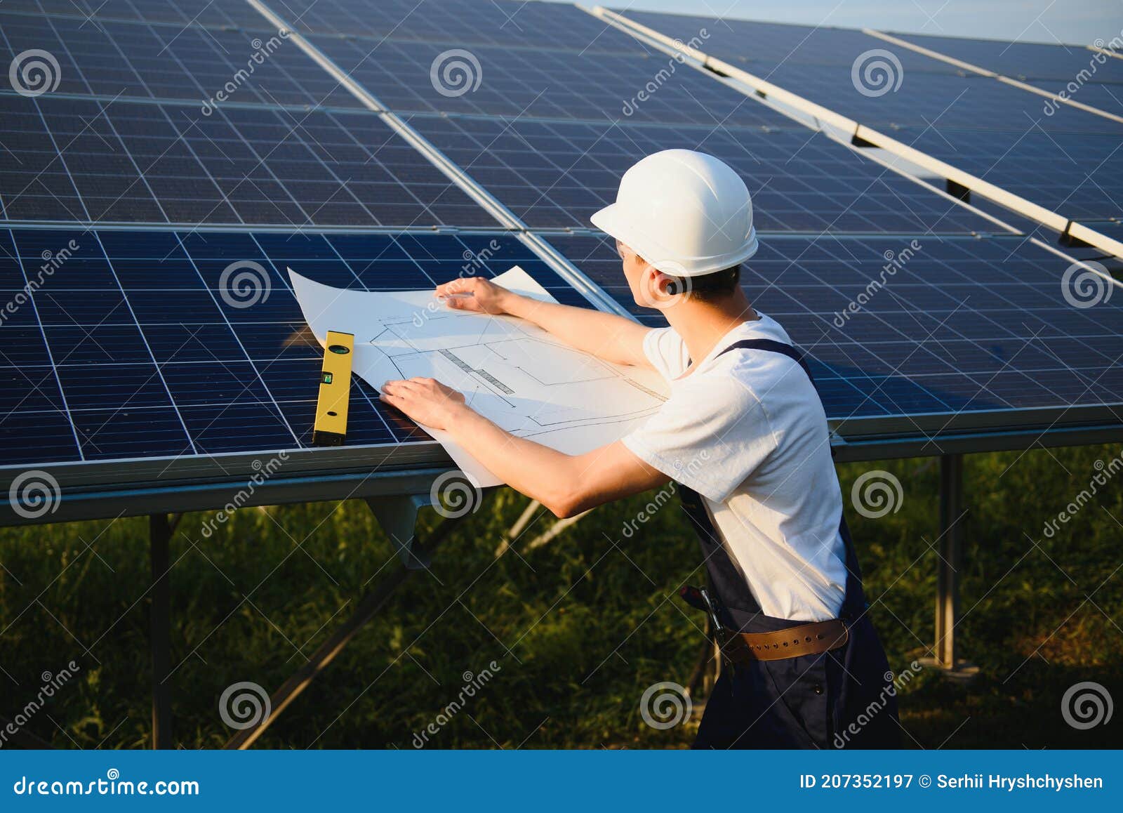 Young Adult Doing Professional Training on Solar Panels Plant Stock ...