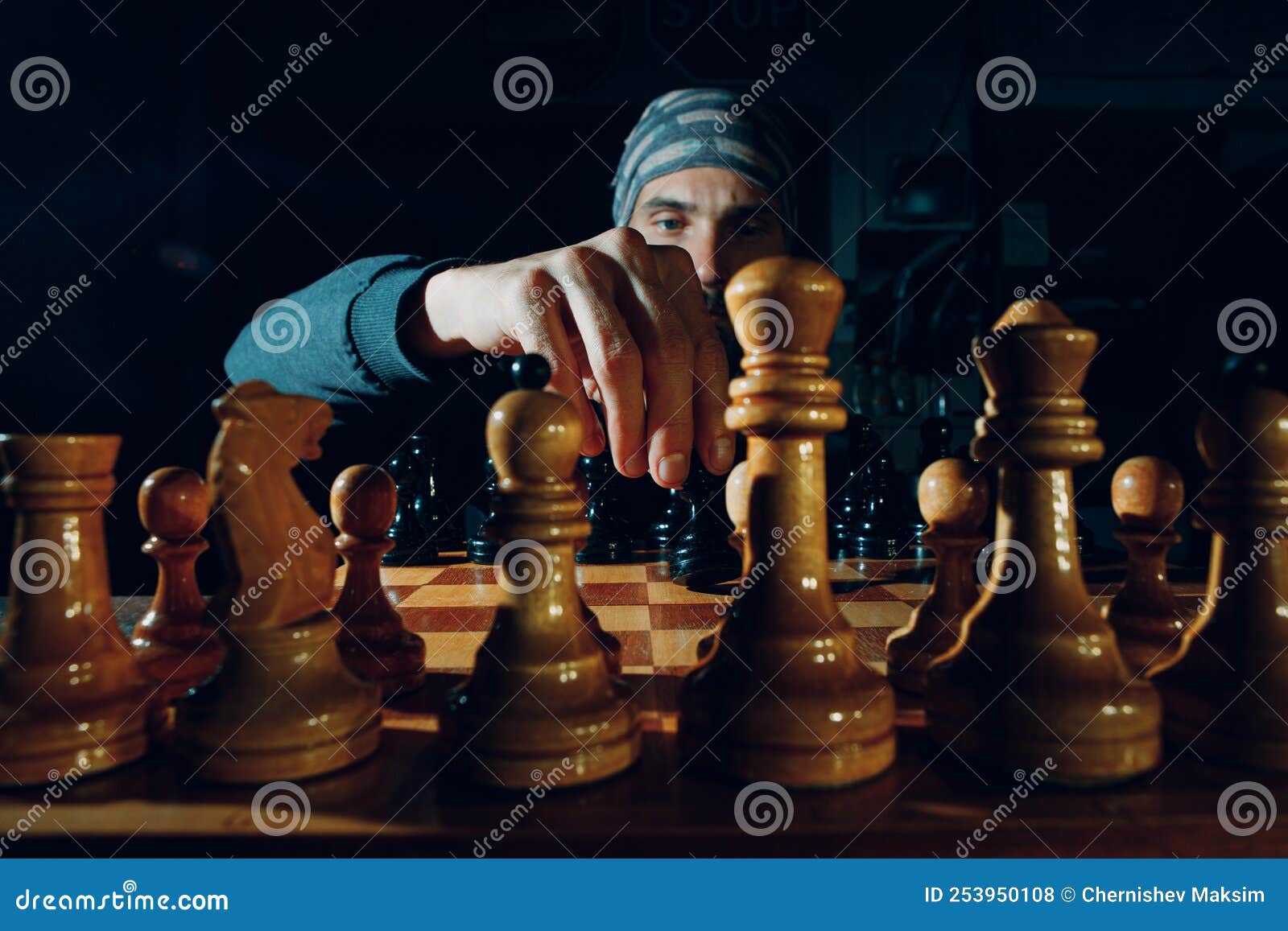 Young Adult Handsome Man Playing Chess in Dark with Side Lit Stock ...