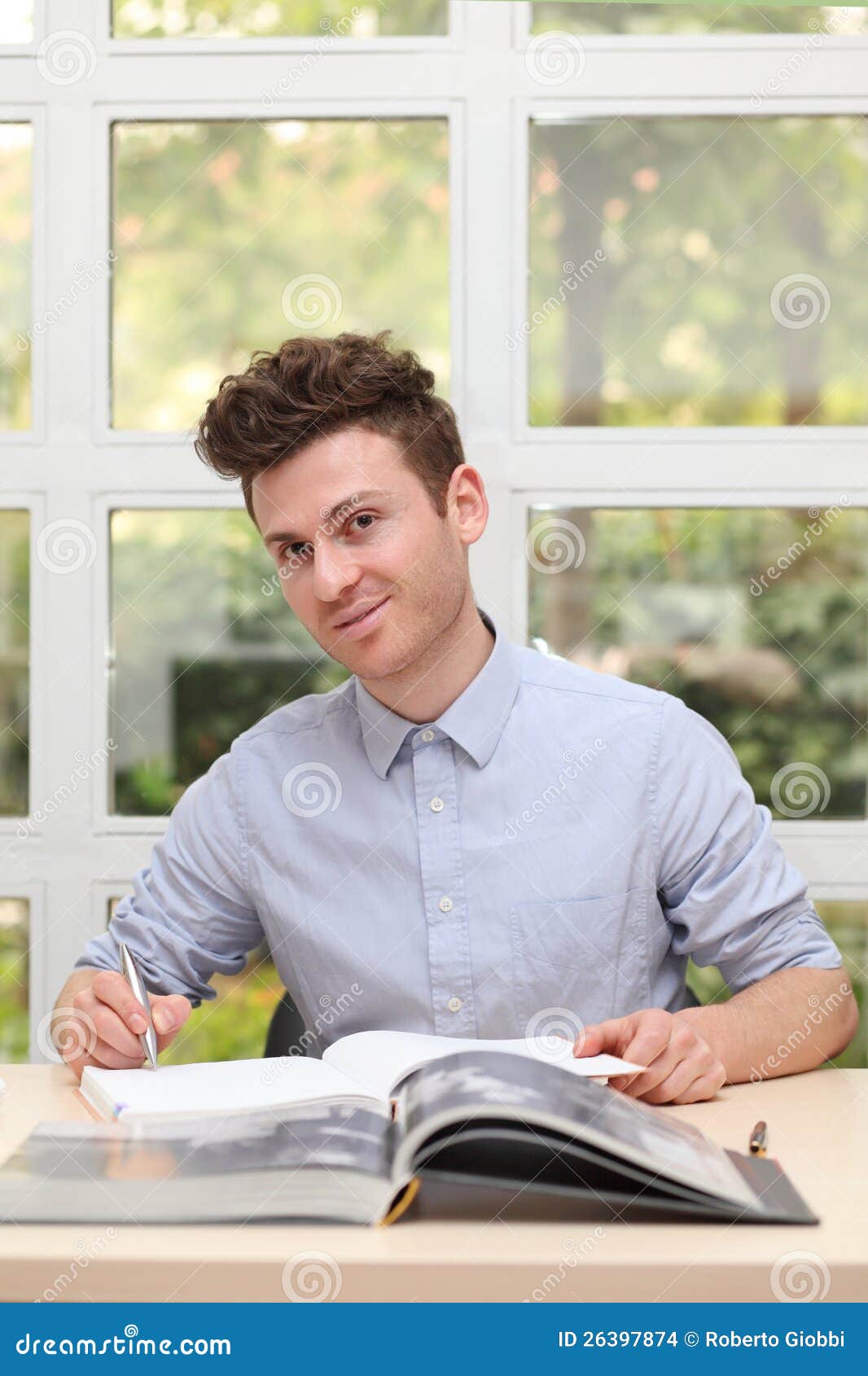 Young Adult Man Writing Note Stock Photo - Image of businessman, staff ...