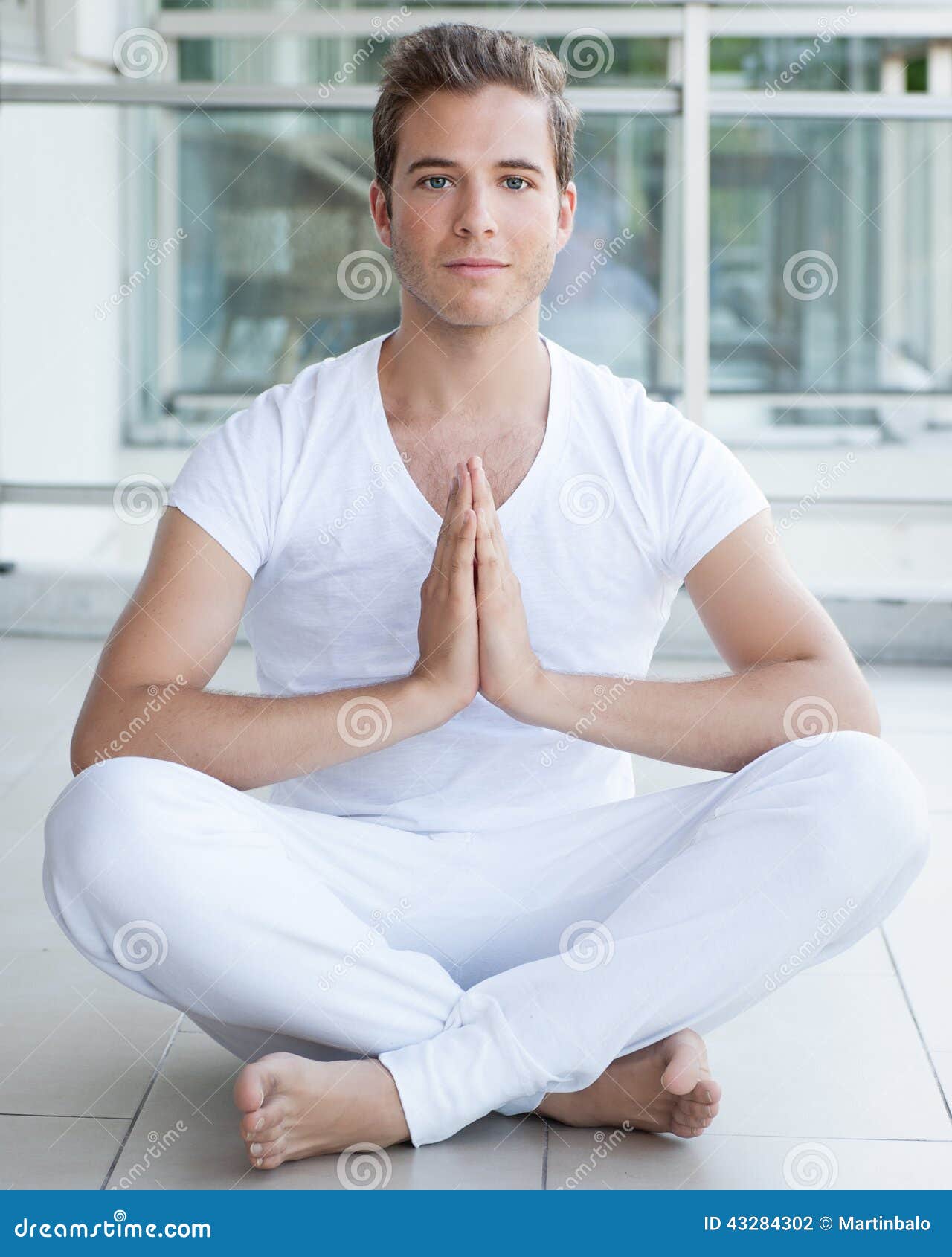 Young Adult Meditating with Hands Together Stock Photo - Image of mind ...