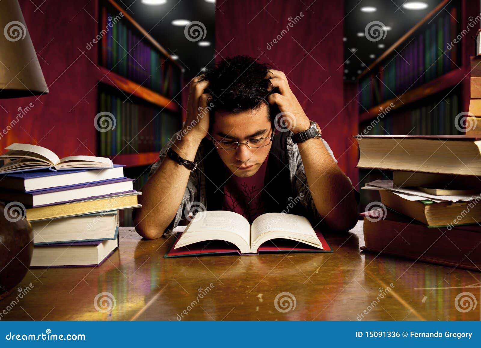 Young Adult Student Reads Book at Library Stock Photo - Image of male ...