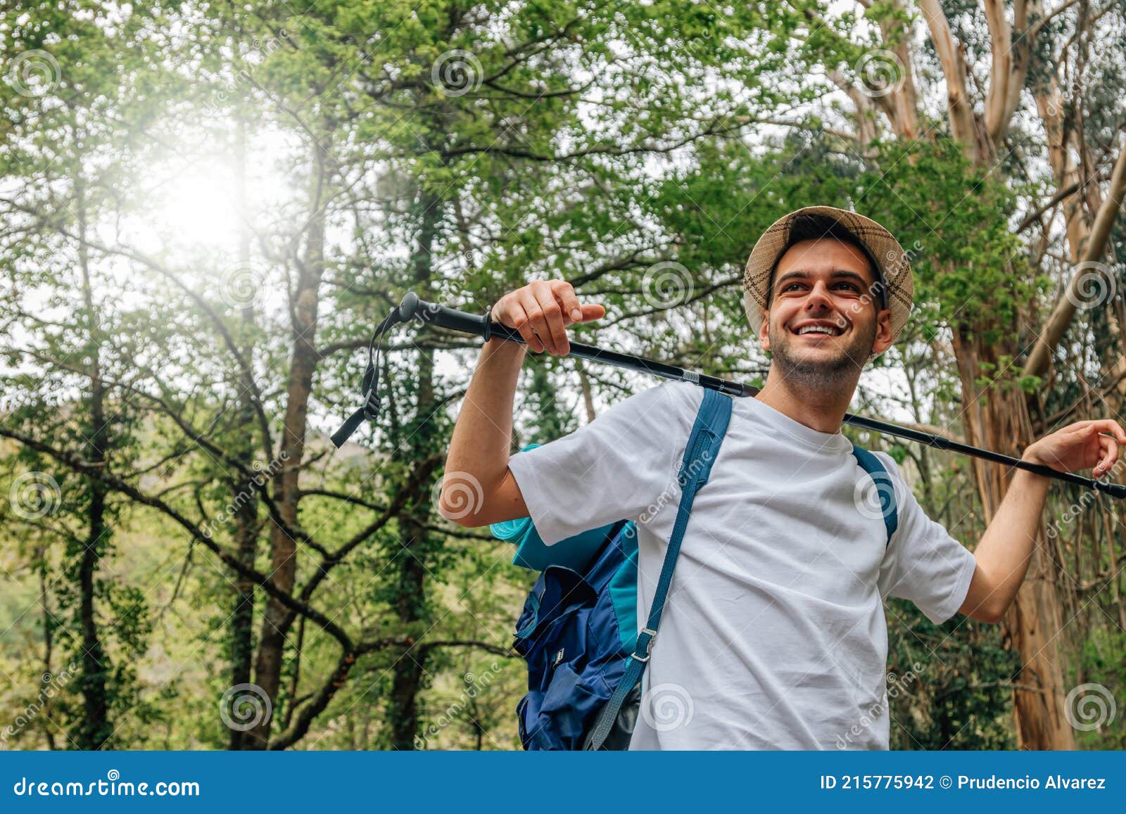 Adventurer with Backpack Smiling in the Forest Stock Photo - Image of ...