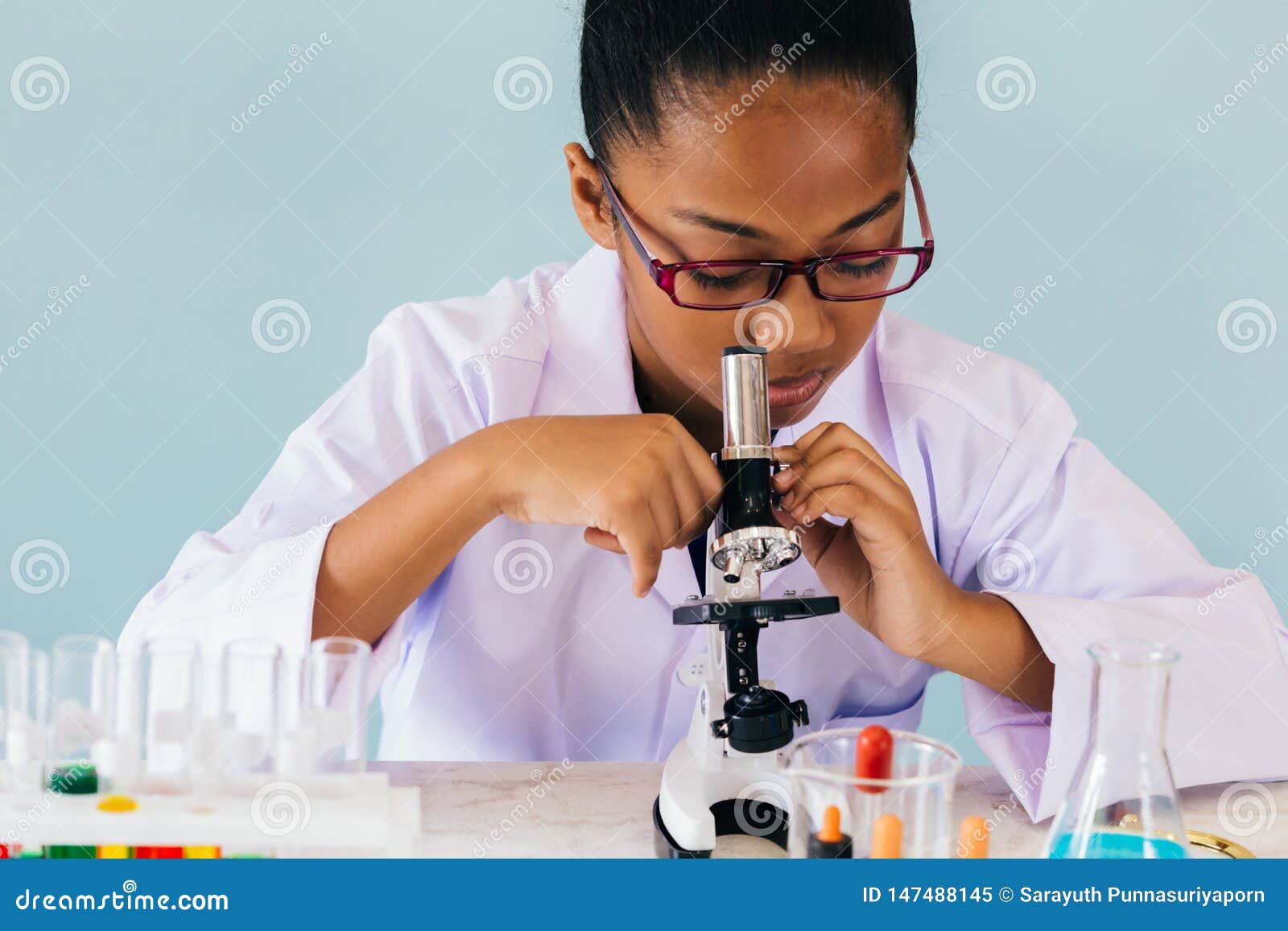Young African American Kid Using Microscope in Lab Stock Image - Image ...