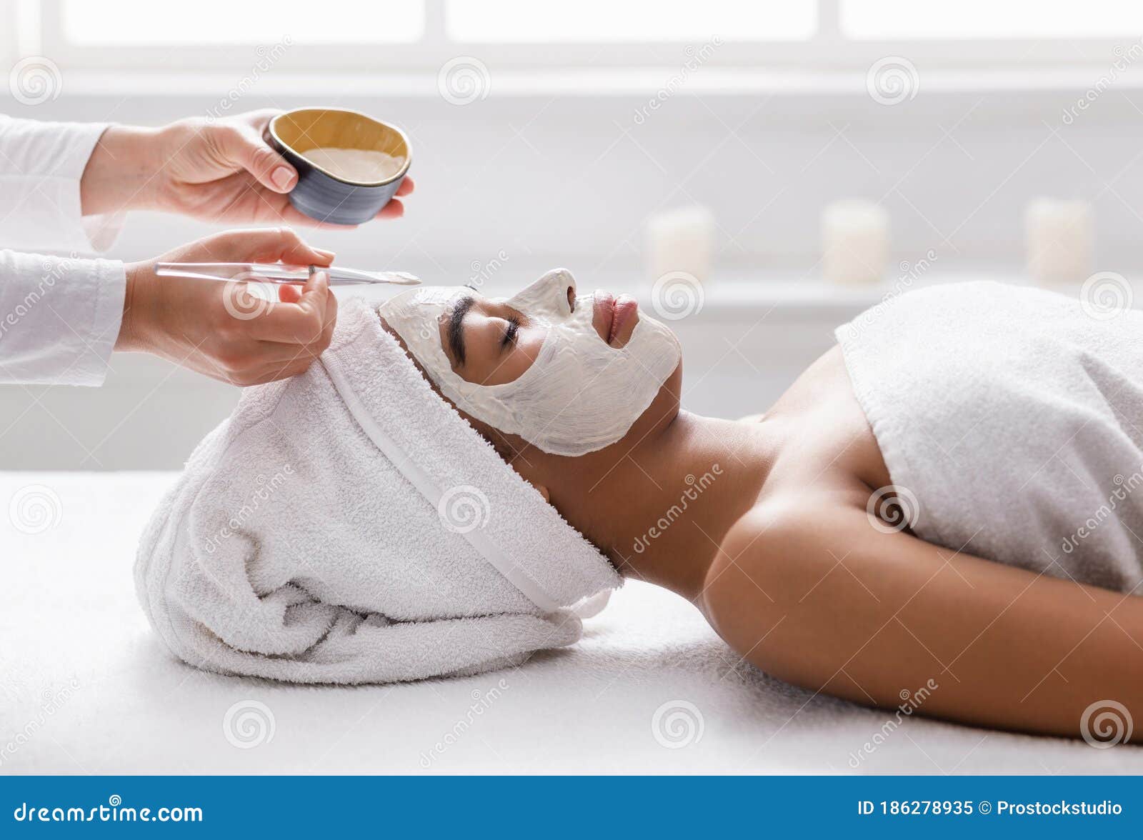 Young African Lady Getting Facial Treatment At Spa Stock Image Image