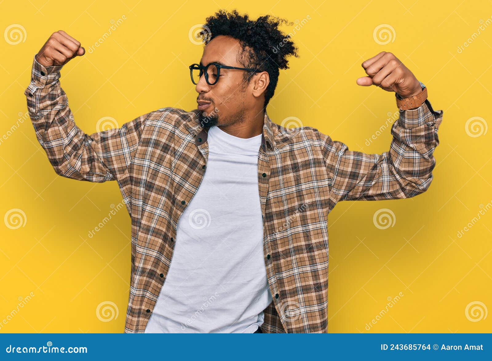 Young African American Man With Beard Wearing Casual Clothes And