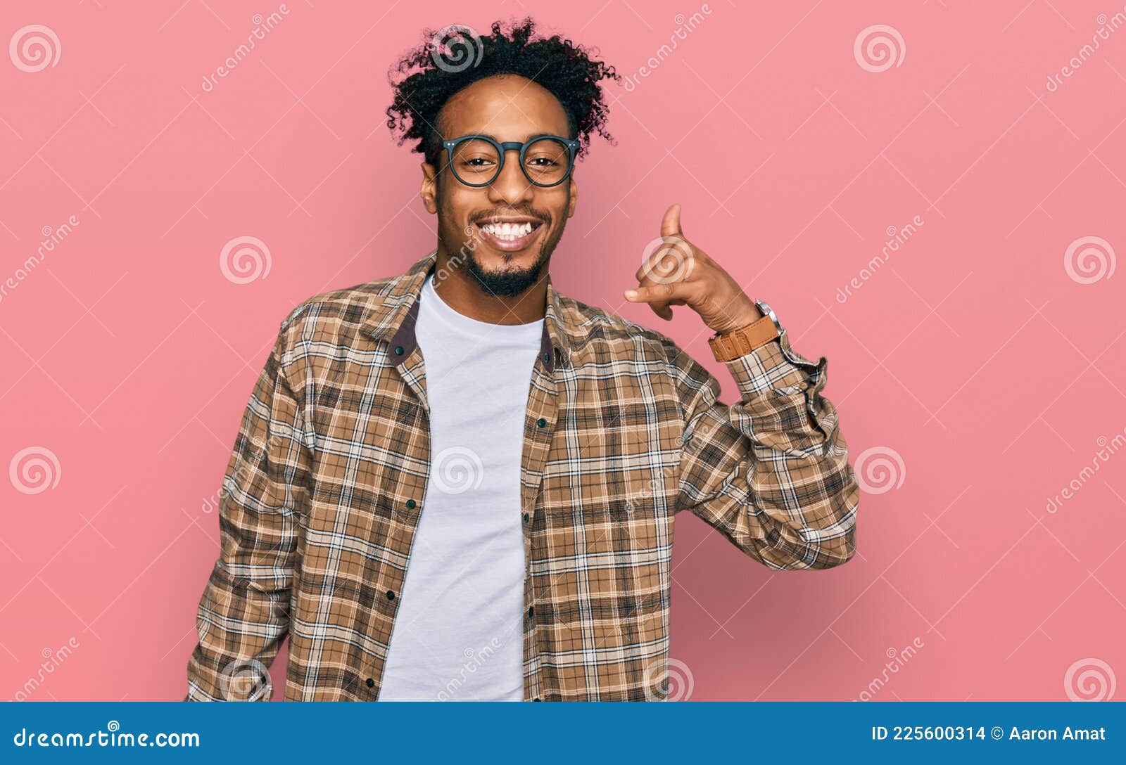 Young African American Man With Beard Wearing Casual Clothes And