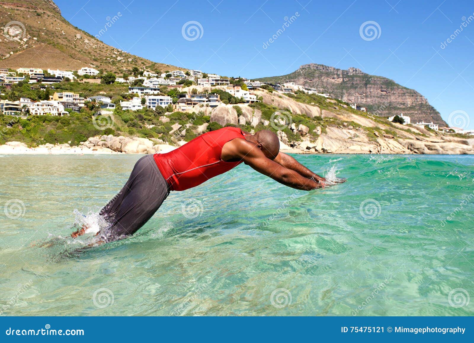 Young African American Man Diving into Sea Stock Image - Image of ...