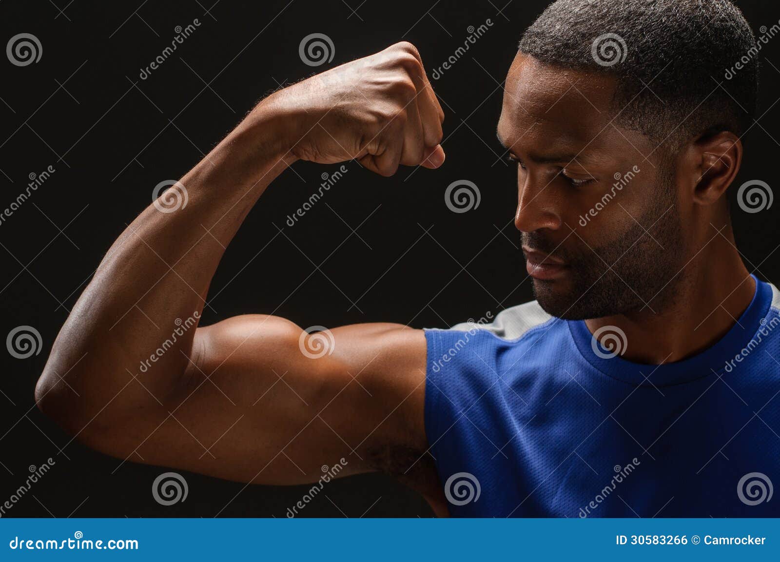 Young African American Man Flexing Biceps Stock Photo - Image of macho ...