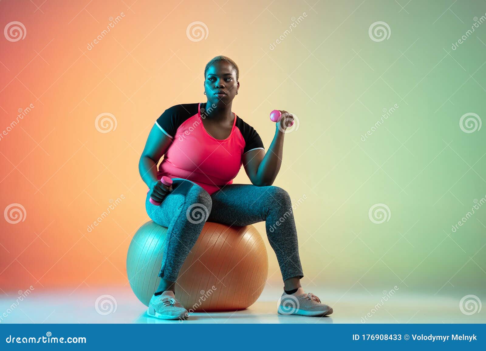 Young African-american Plus Size Female Model`s Training on Gradient ...