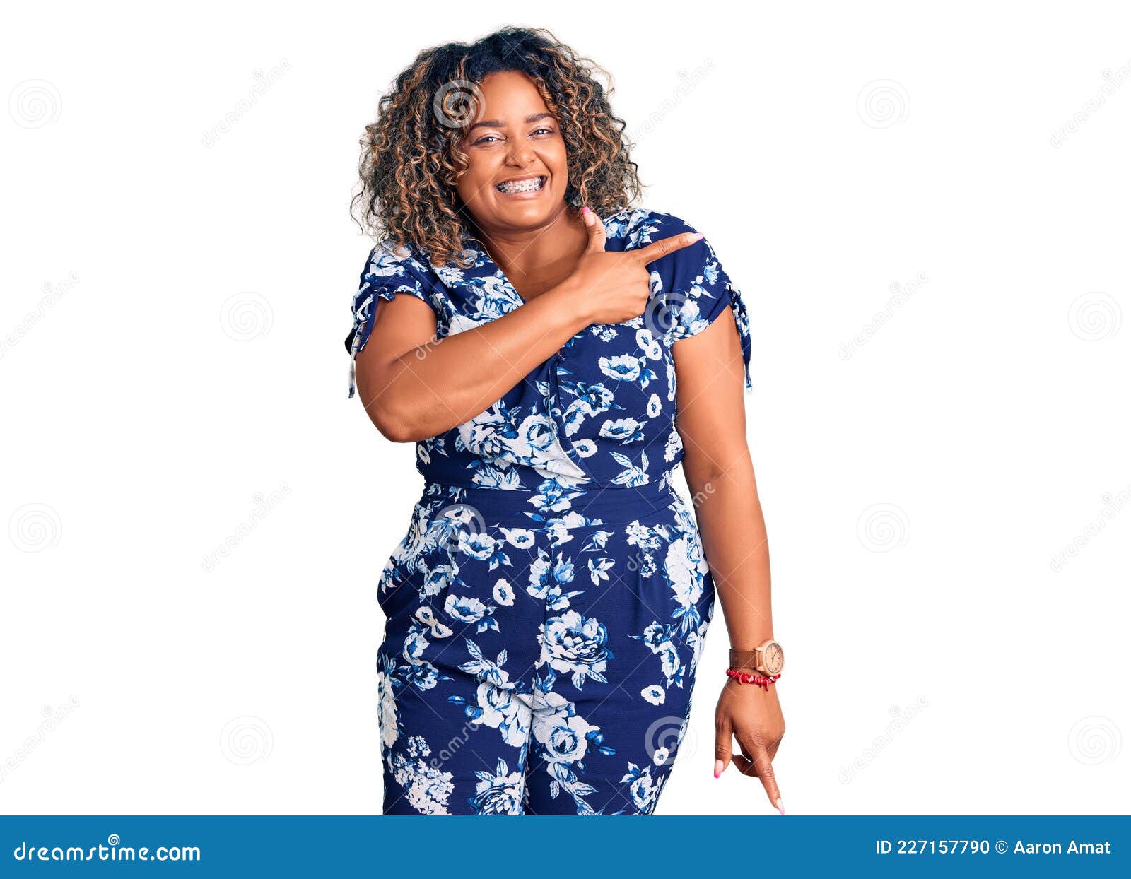 Young African American Plus Size Woman Wearing Casual Clothes Cheerful