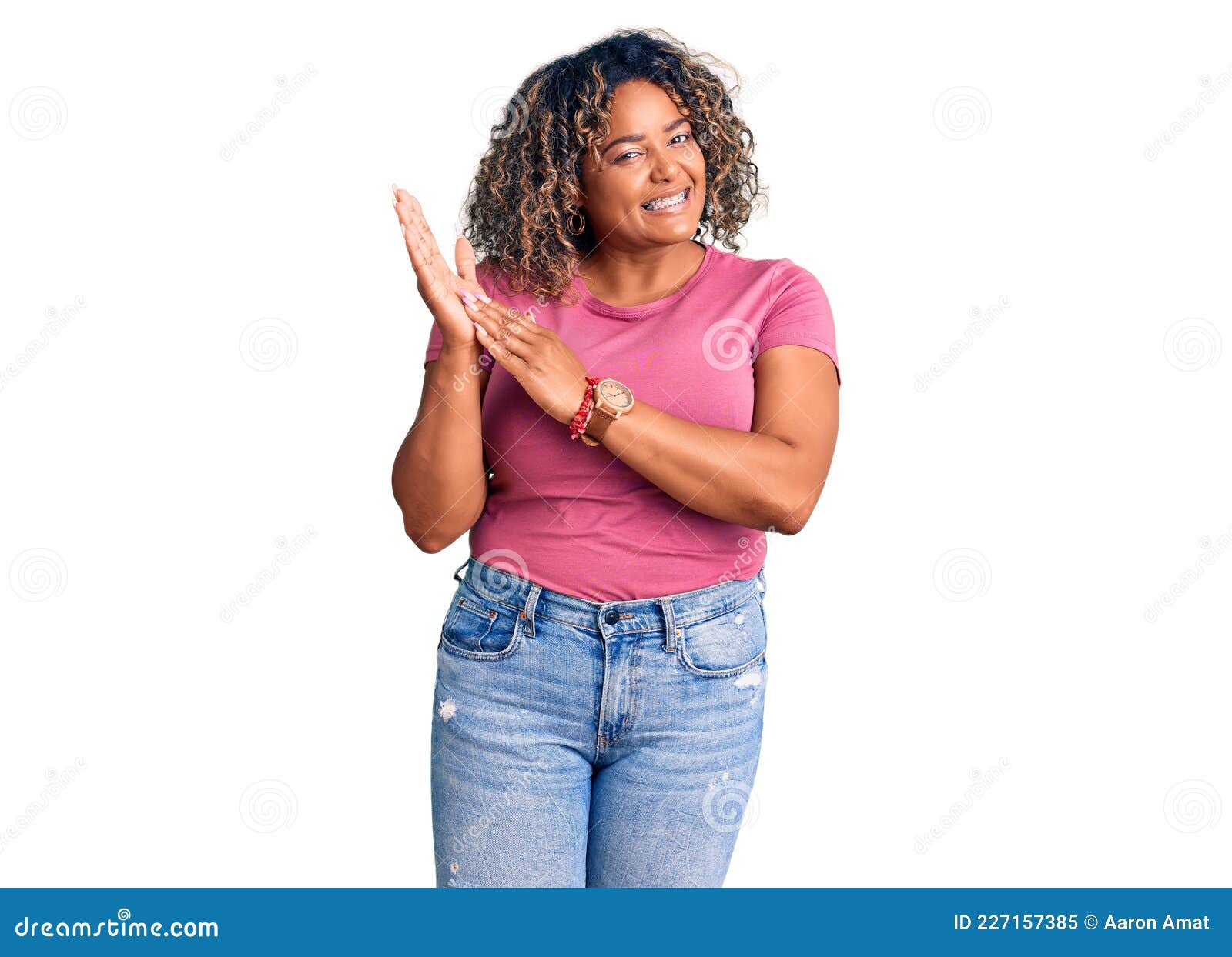 Young African American Plus Size Woman Wearing Casual Clothes Clapping