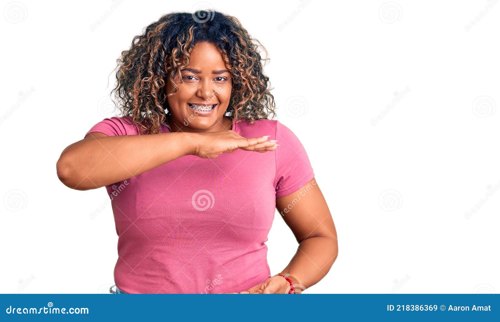 Young African American Plus Size Woman Wearing Casual Clothes Gesturing