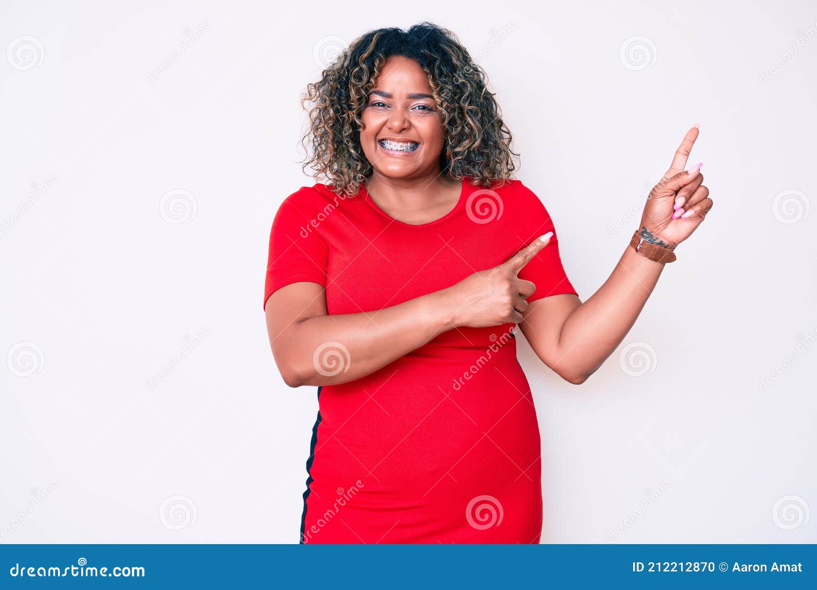 Young African American Plus Size Woman Wearing Casual Clothes Smiling
