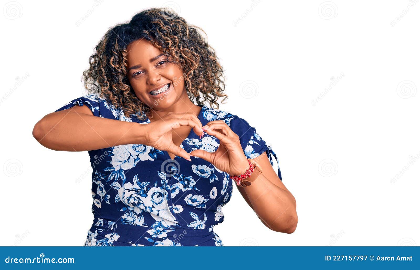 Young African American Plus Size Woman Wearing Casual Clothes Smiling