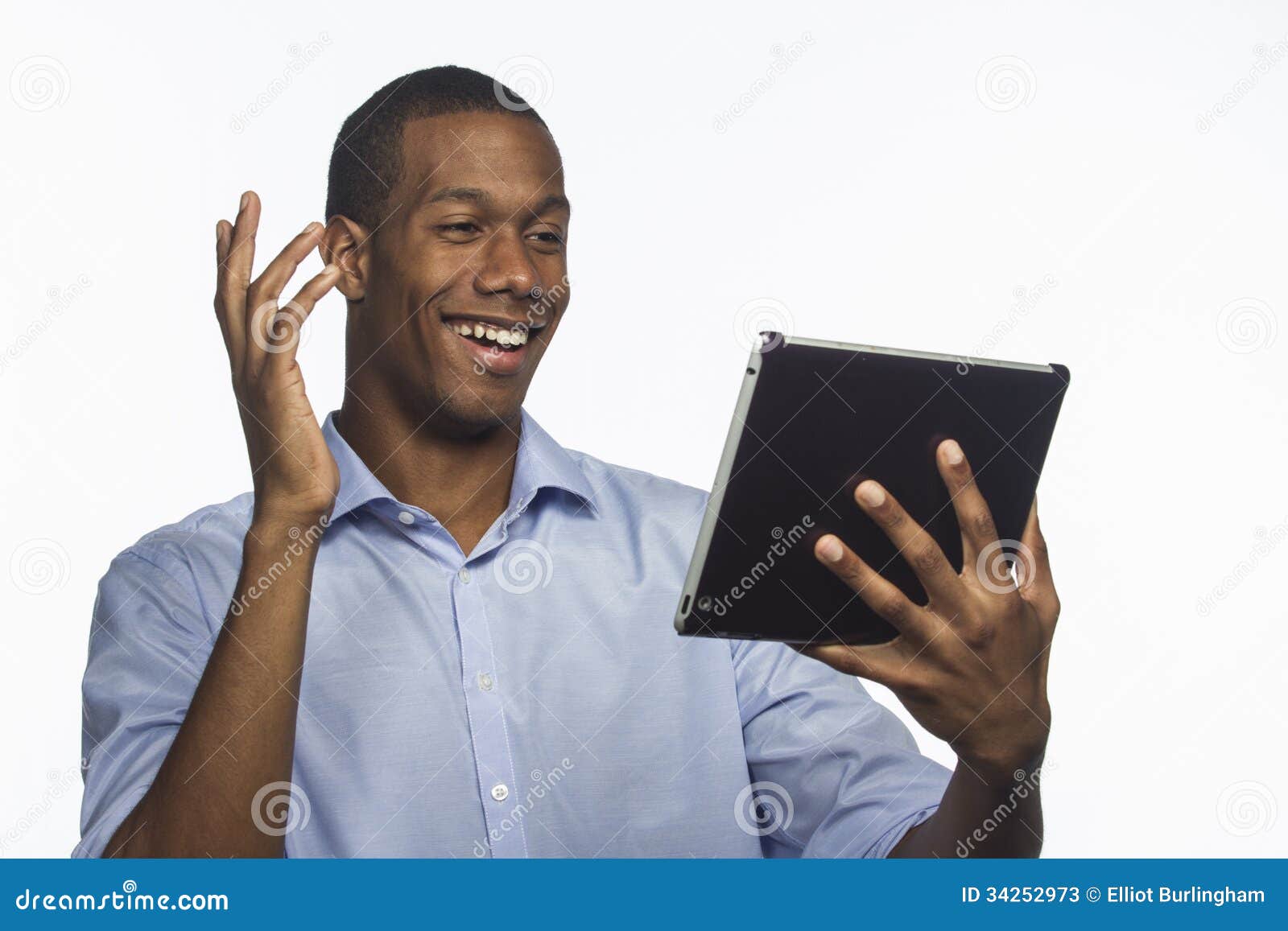 Young African American Using an Electronic Tablet, Horizontal Stock ...