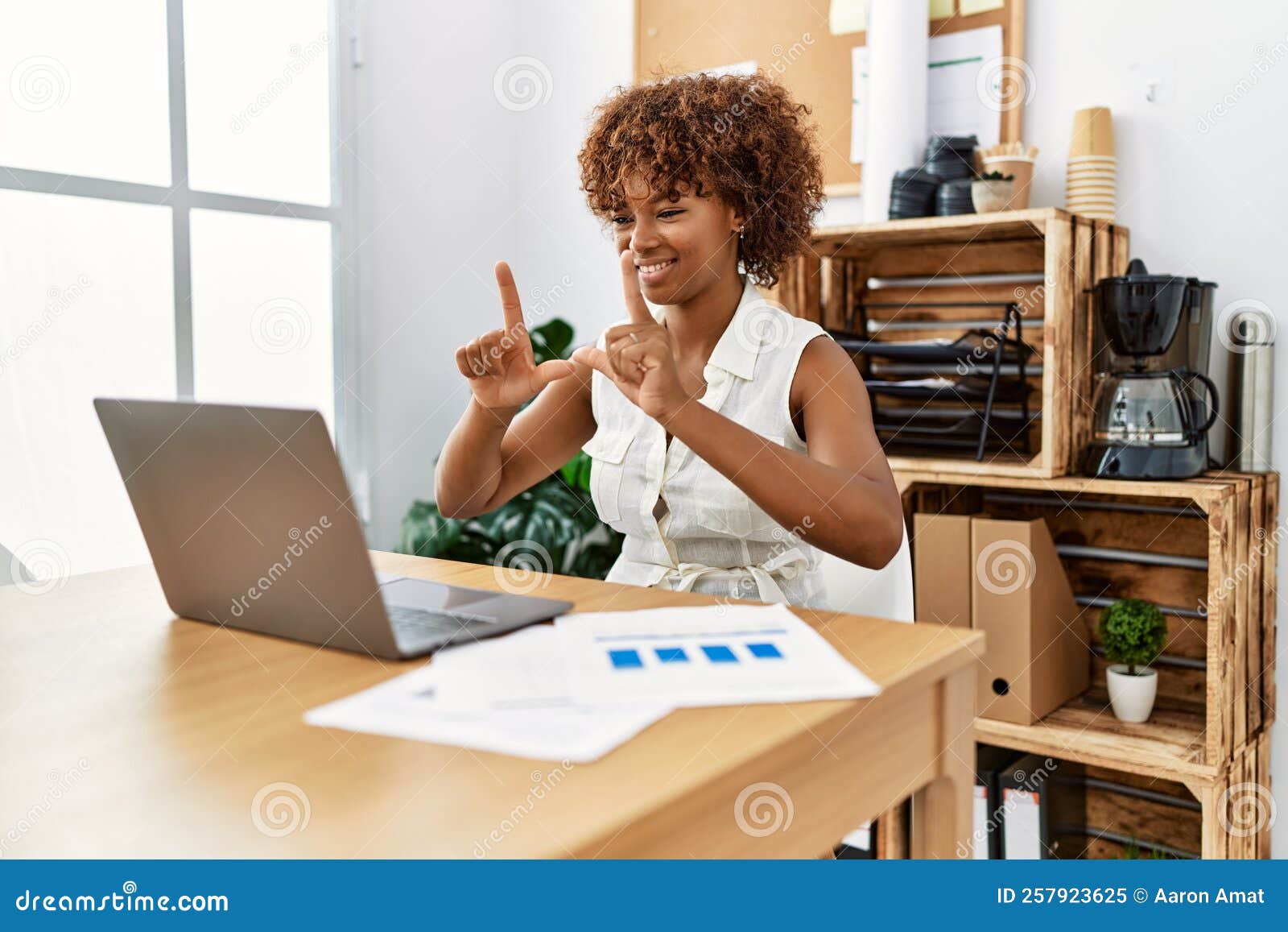 Young African American Woman Having Video Call Using Deaf Language at ...