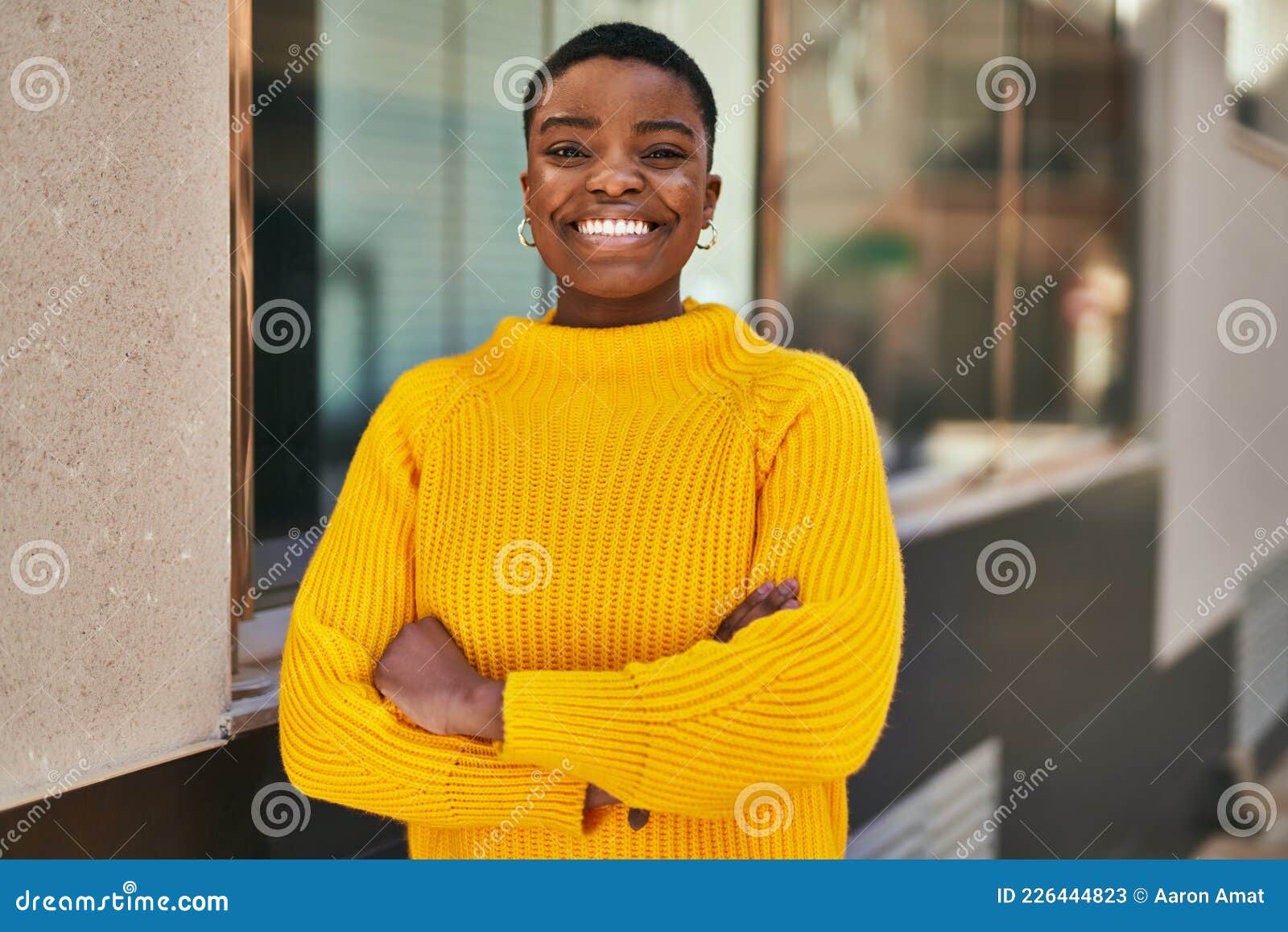 Young African American Woman Smiling Happy Standing At The City Stock