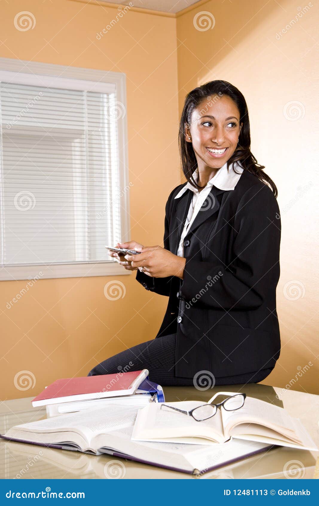 Young African-American Woman Texting and Studying Stock Image - Image ... Young African-American Woman Texting and Studying Stock Image - Image ...