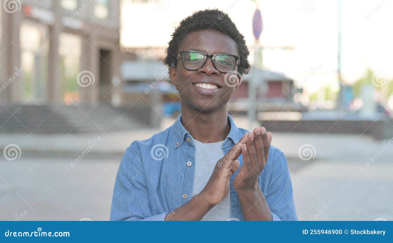 Young African Man Clapping in Appreciation Outdoor Stock Photo - Image ...