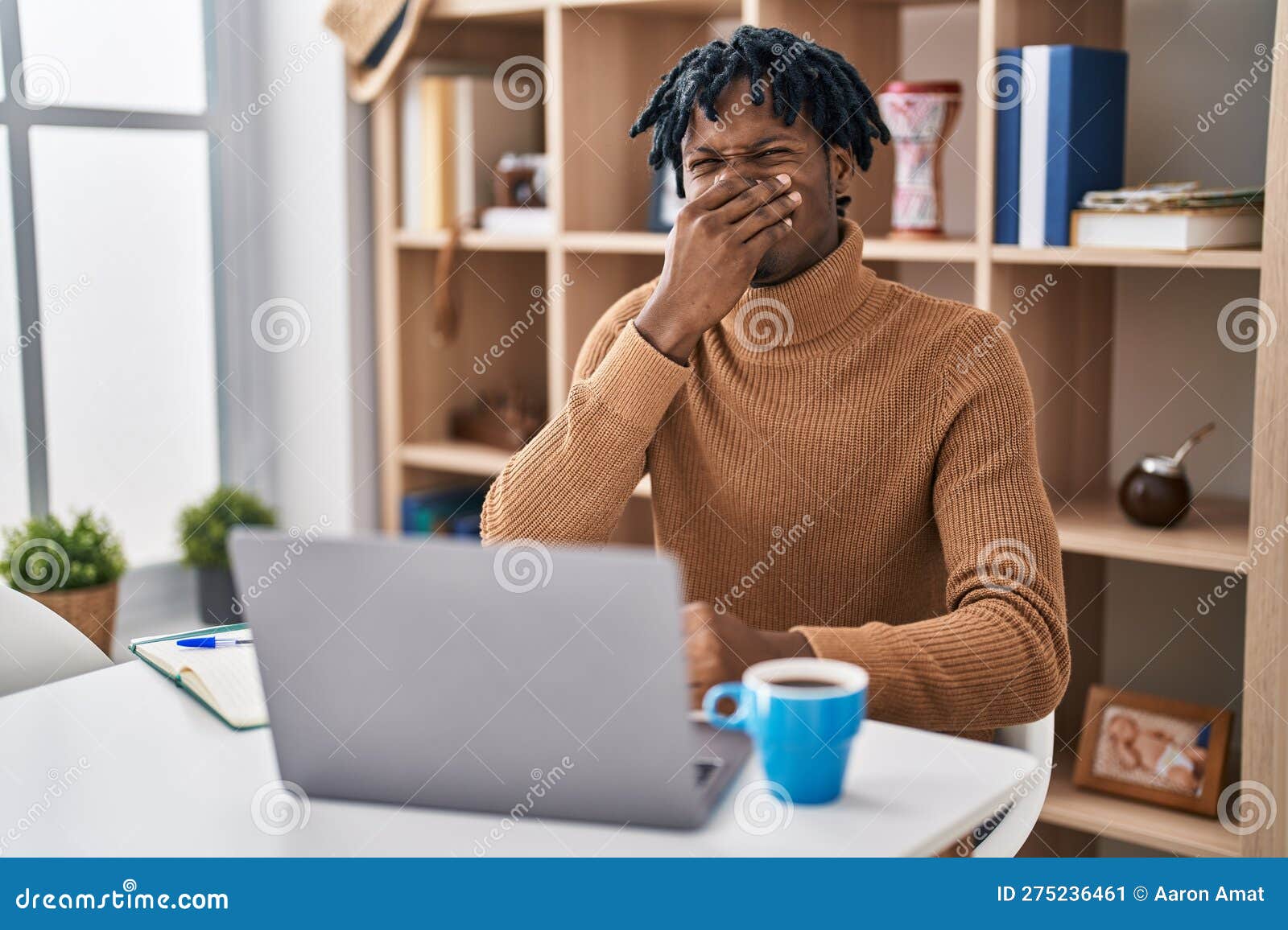 Young African Man with Dreadlocks Working Using Computer Laptop ...