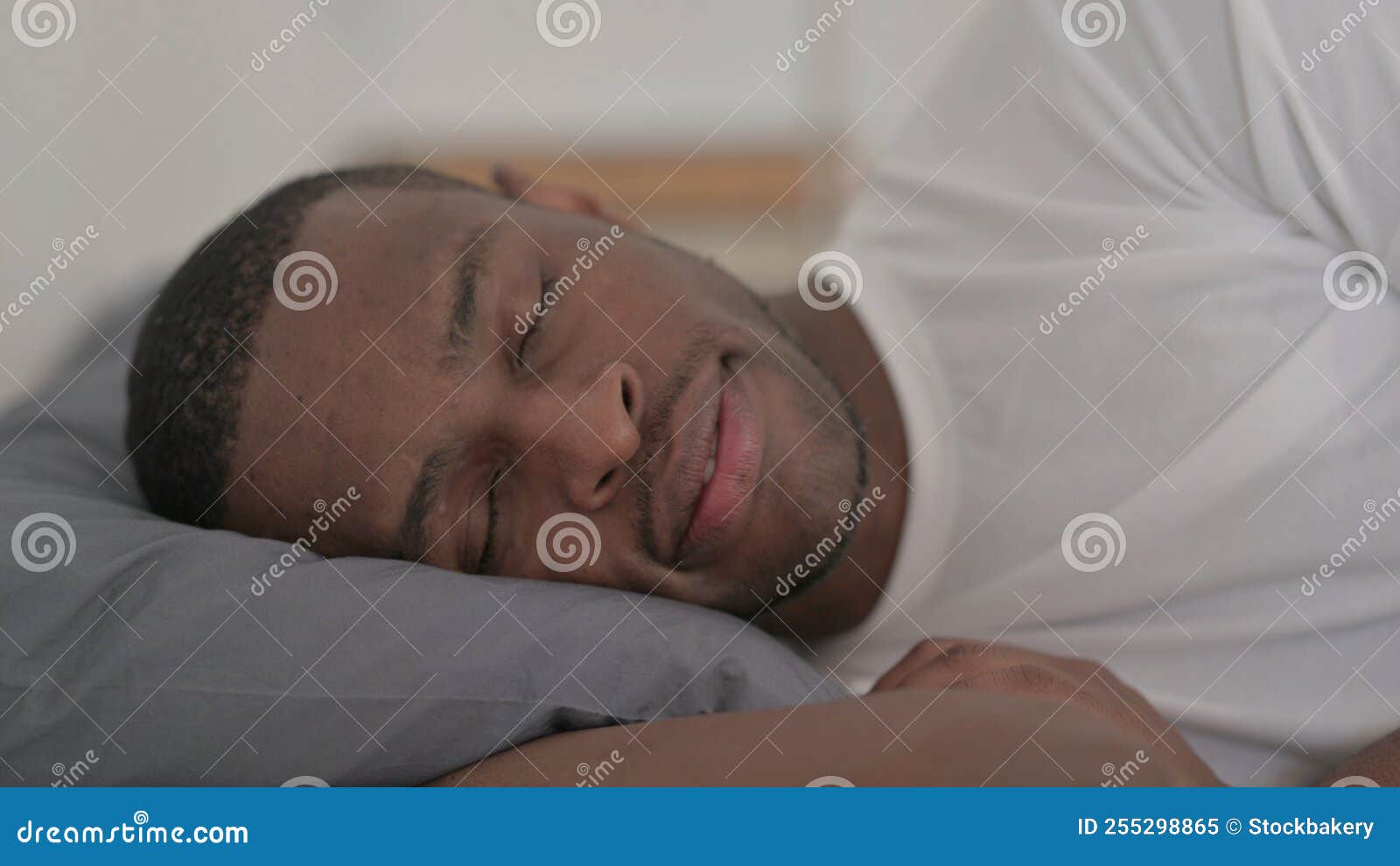 African Man Sleeping in Bed Peacefully Stock Image - Image of ...