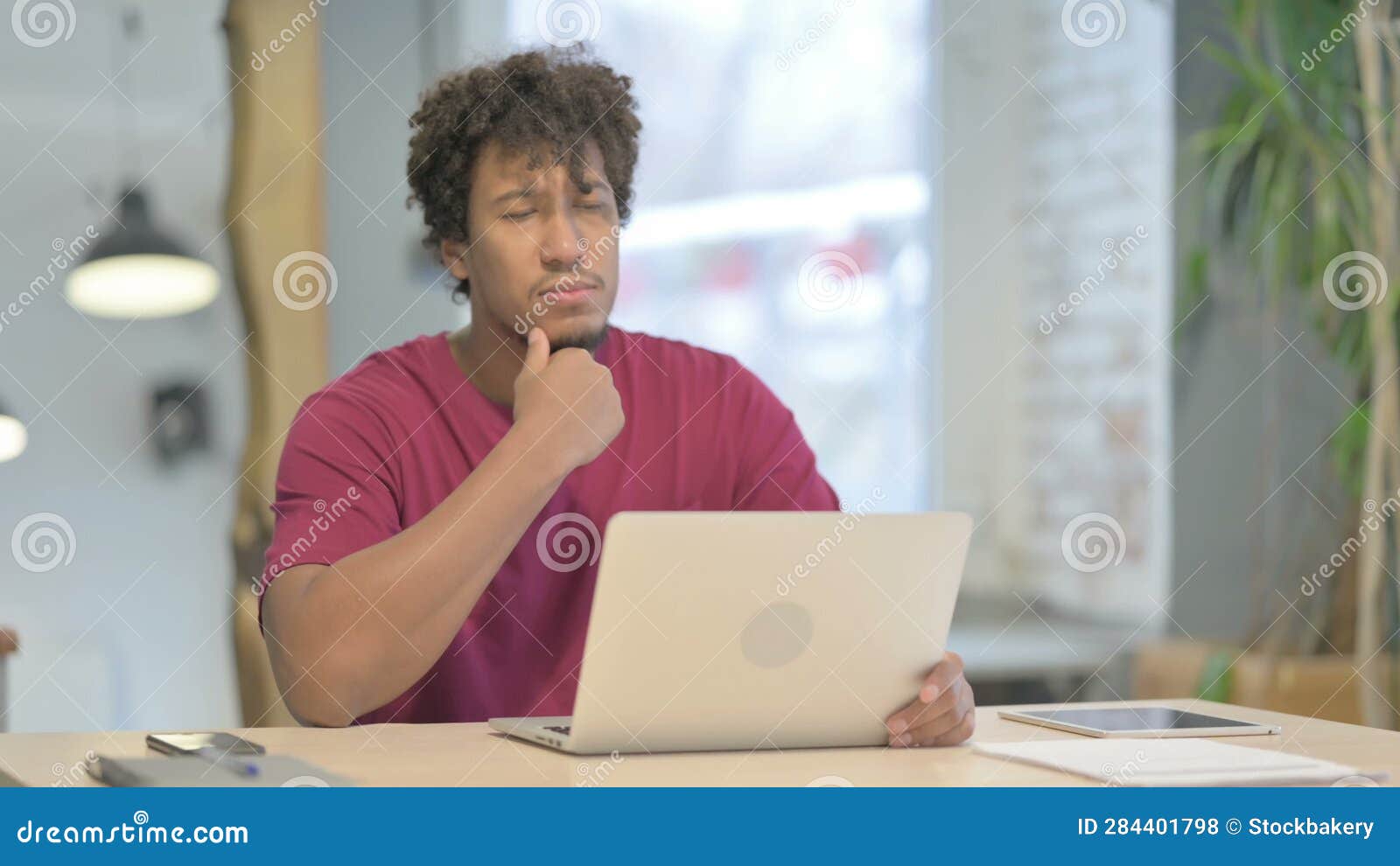 African Man Thinking while Working on Laptop Stock Footage - Video of ...