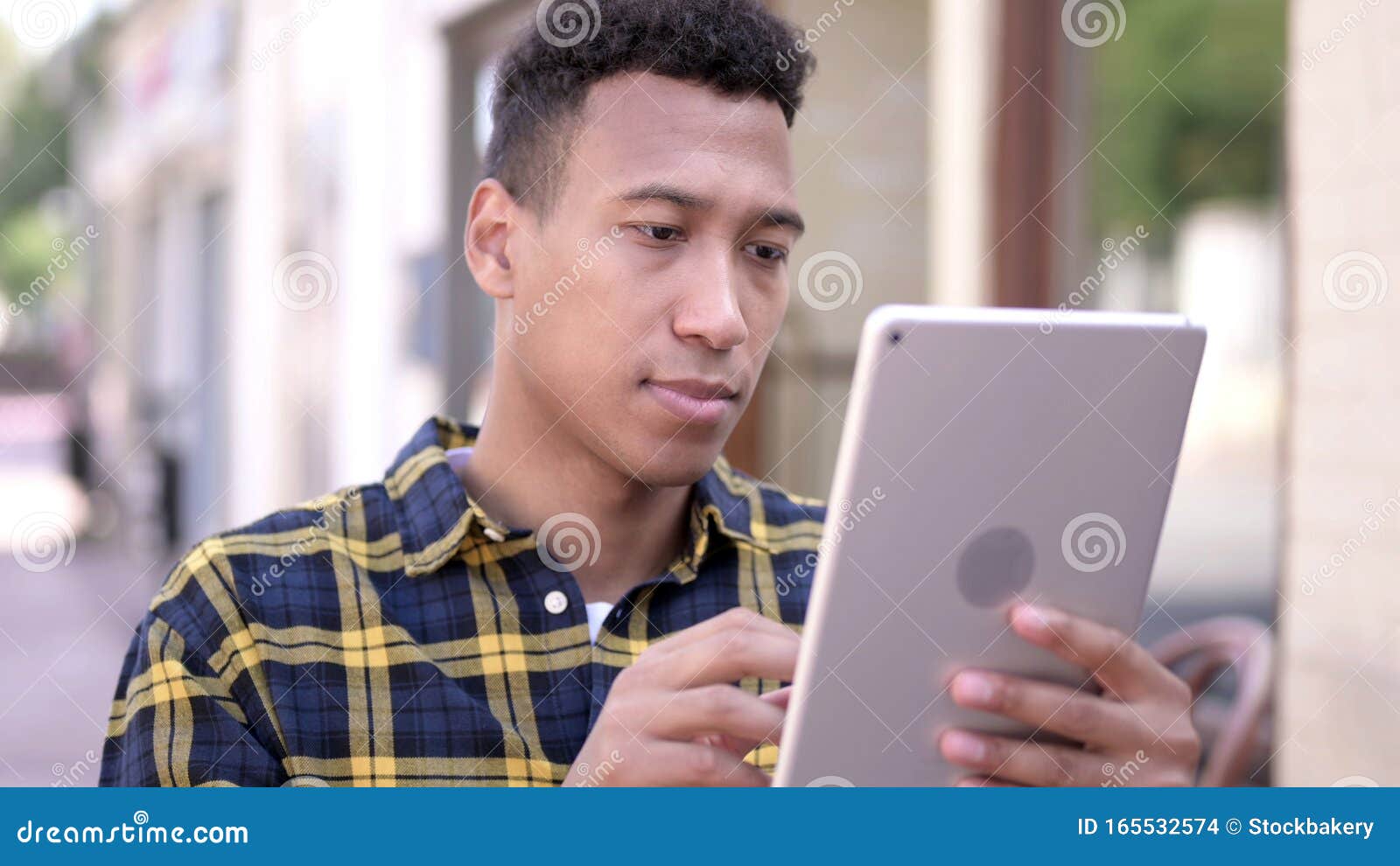 The Young African Man Using Tablet Outdoor Stock Photo - Image of adult ...