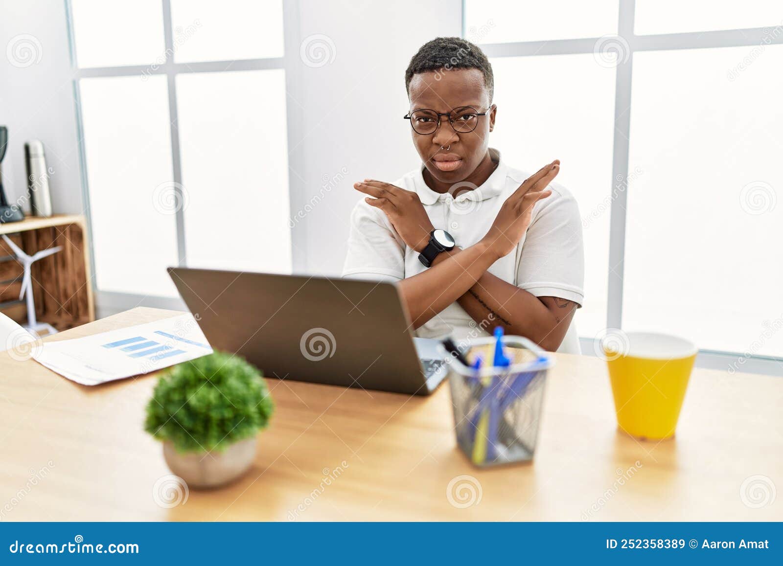 Young African Man Working at the Office Using Computer Laptop Rejection ...