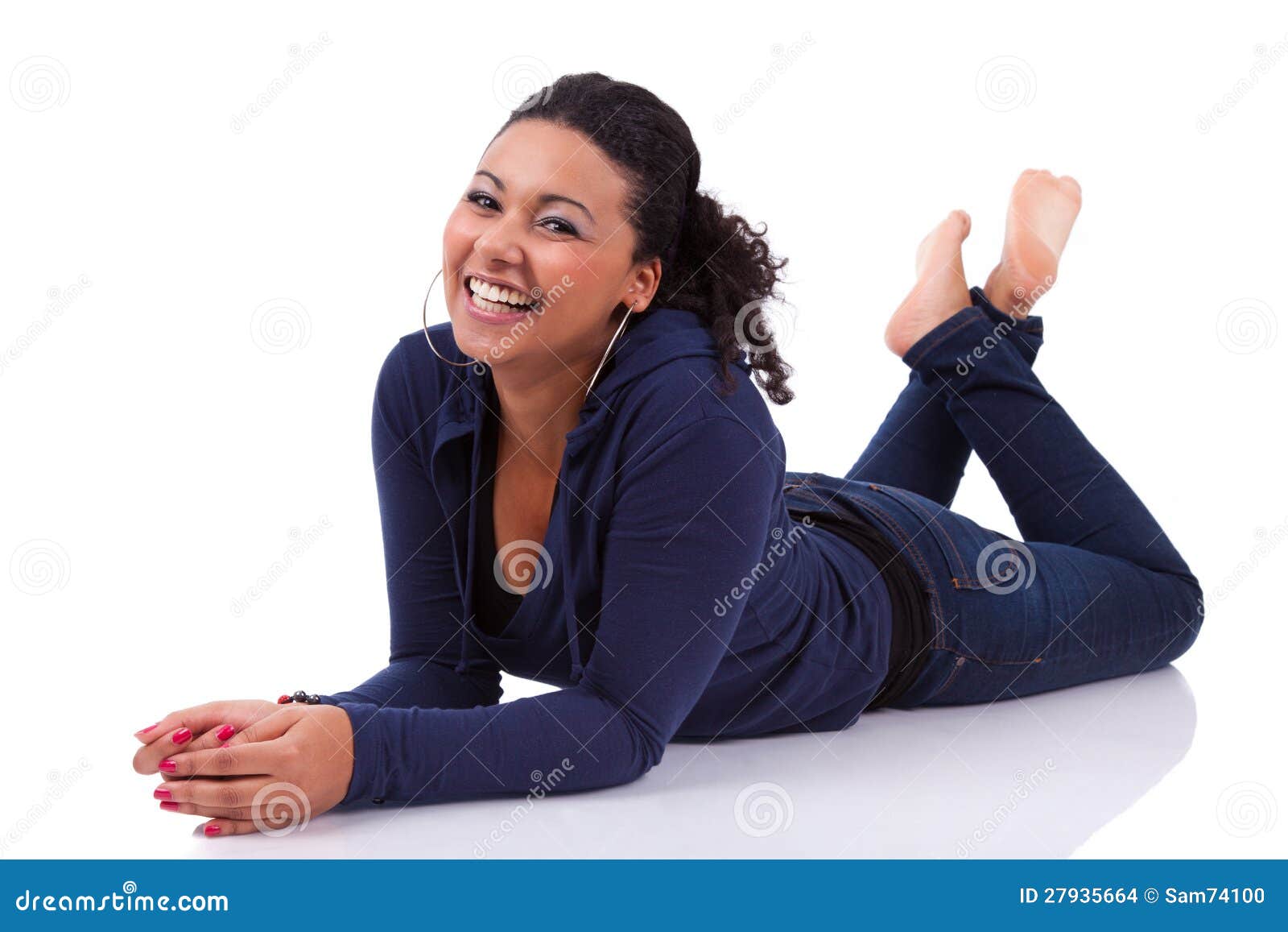 Young African Woman Lying Down on the Floor Stock Photo - Image of ...