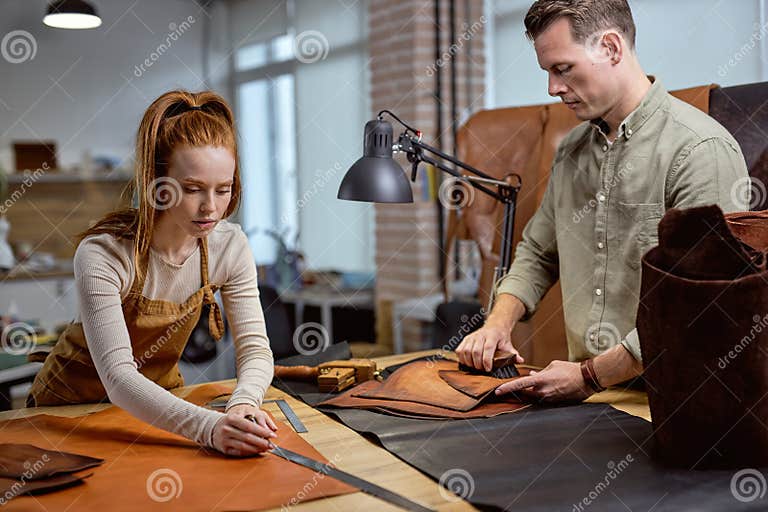 Young Ambitious People Crafting High-quality Leather Products Stock ... Young Ambitious People Crafting High-quality Leather Products Stock ...