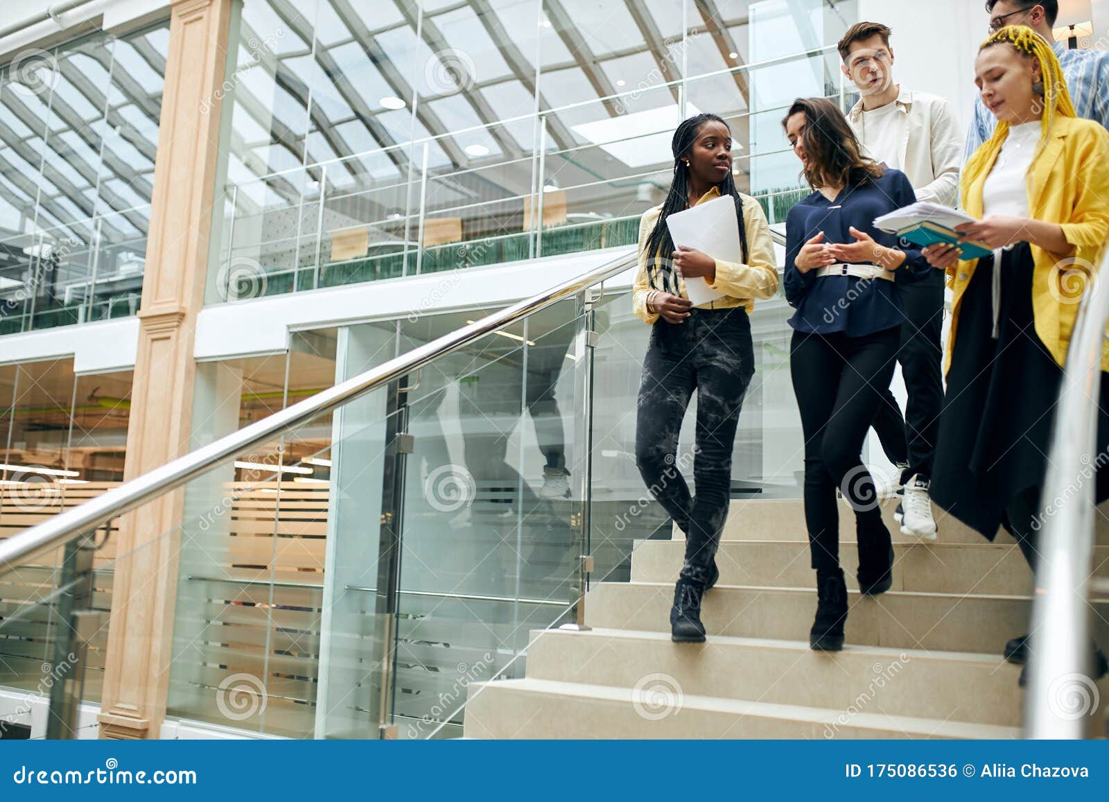 Young Ambitious Talented Office Workers Talking, Discussing a New ...