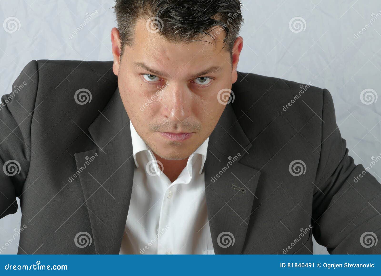 Young angry business man stock image. Image of businessman - 81840491