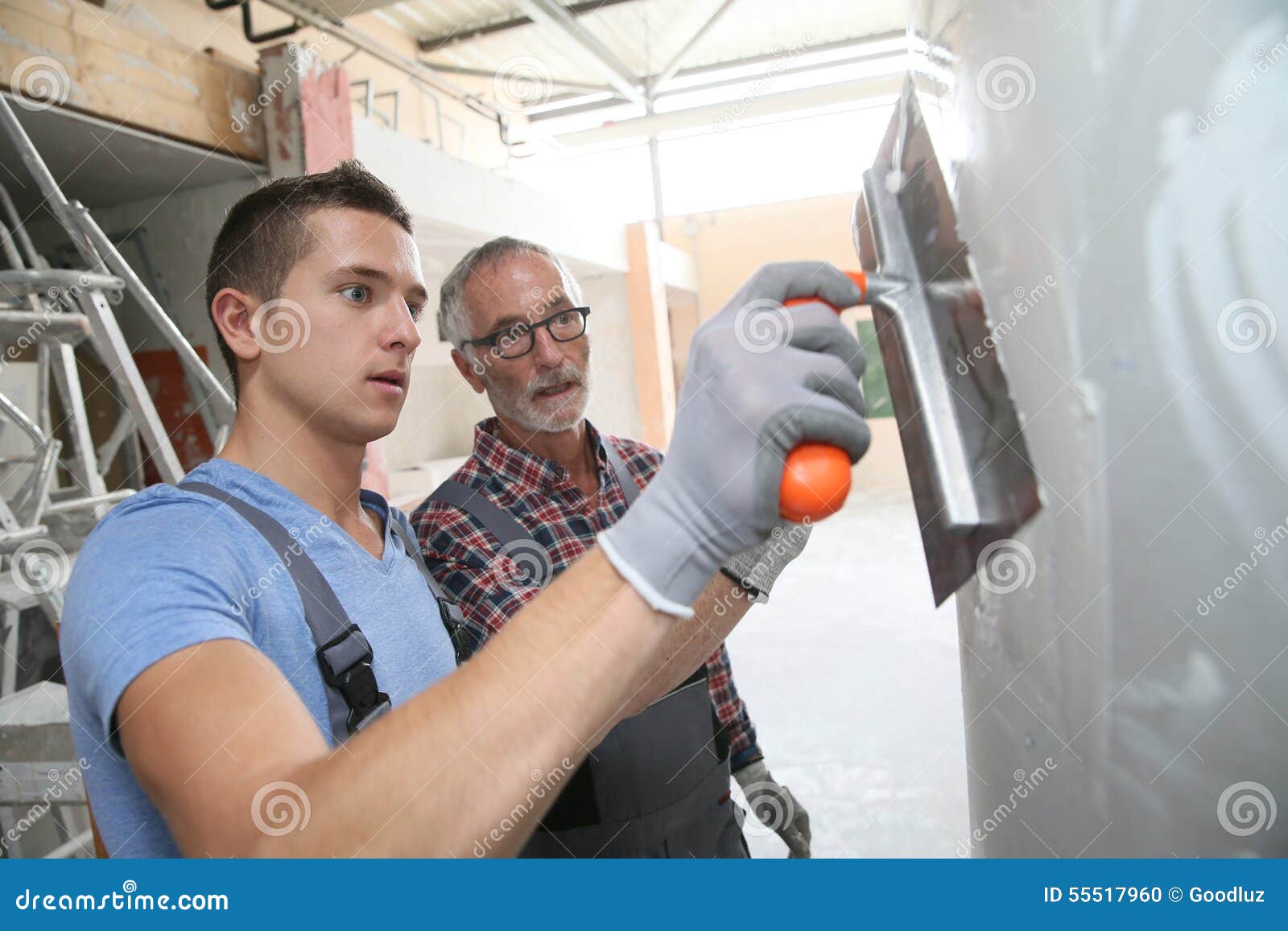 Young Apprentice Plasterer Working On Indoor Wall Royalty-Free Stock ...