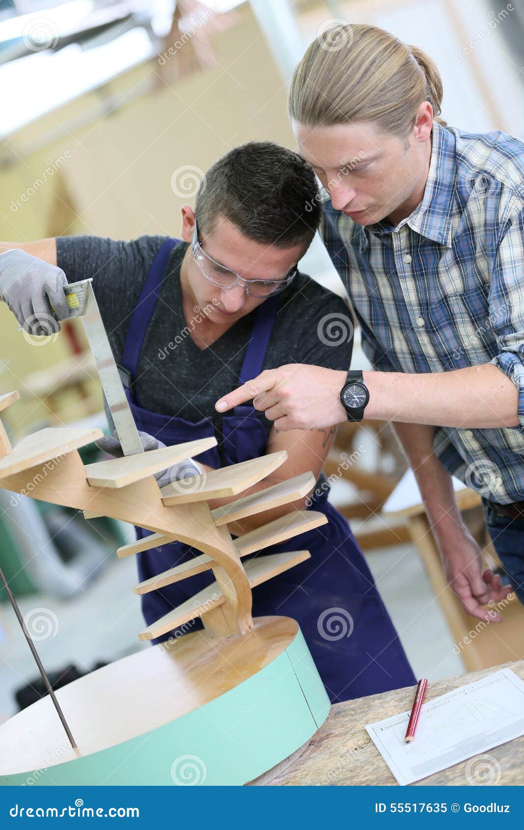 Young Apprentice with Instructor Working on Wood Stock Image - Image of ...