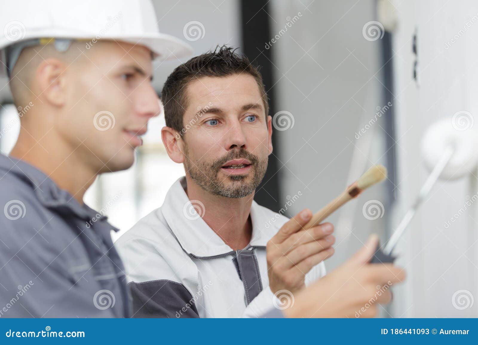 Young Apprentice Painter in Professional Training Stock Image - Image ...
