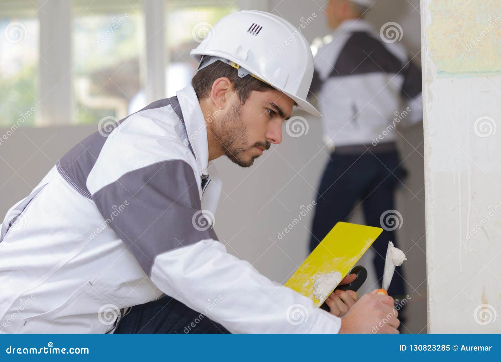Young Apprentice Plasterer Working on Indoor Wall Stock Image - Image ...