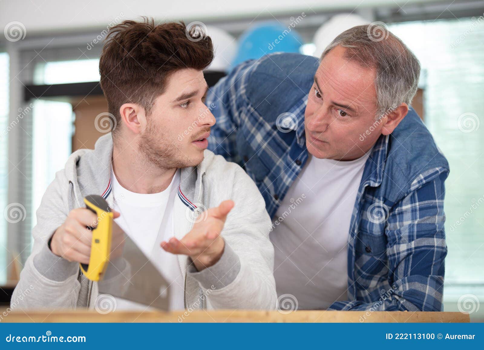 Young Apprentice Talking To Teacher Stock Photo - Image of apprentice ...