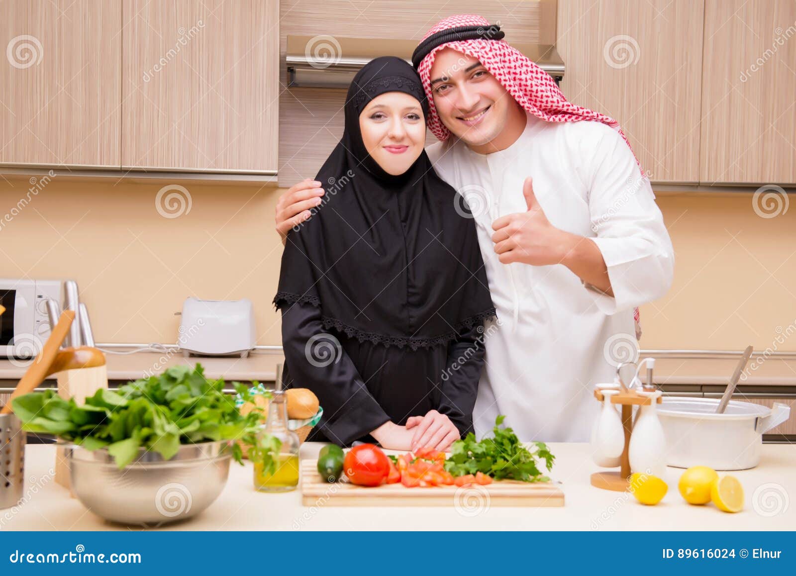 The Young Arab Family in the Kitchen Stock Photo - Image of happiness ...