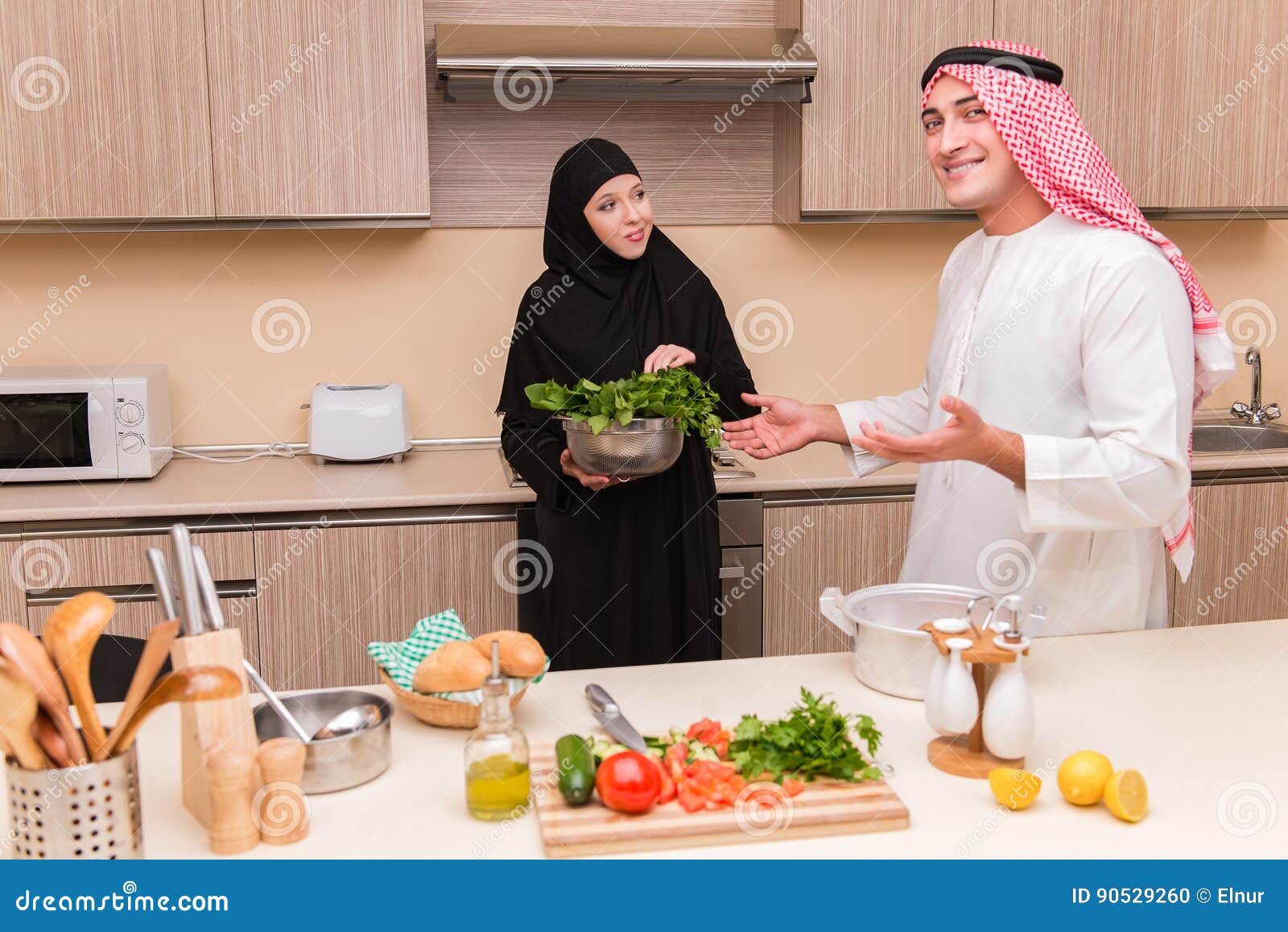 The Young Arab Family in the Kitchen Stock Photo - Image of kitchen ...