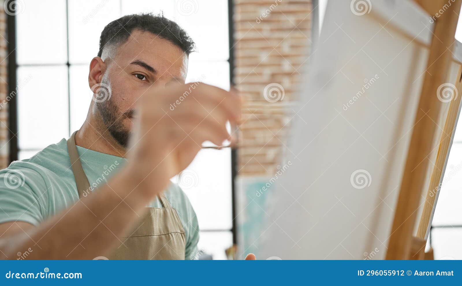 Young Arab Man Artist Drawing with Serious Face at Art Studio Stock ...